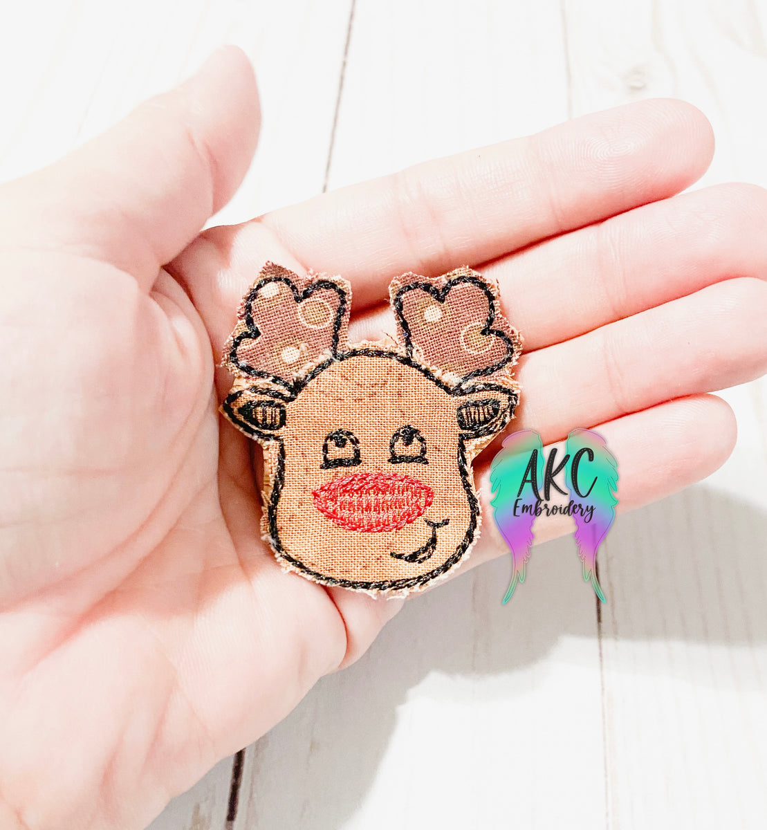 ITH reindeer magnet 2023 – AKC Embroidery and Digital Designs