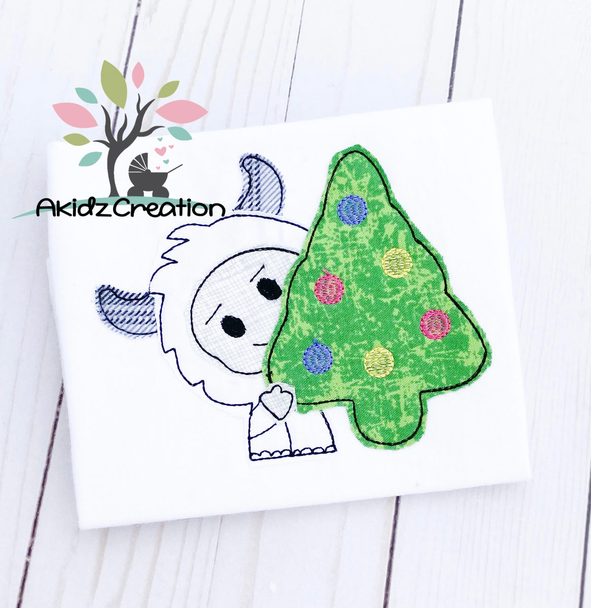 Yeti behind christmas tree 2022 – AKC Embroidery and Digital Designs
